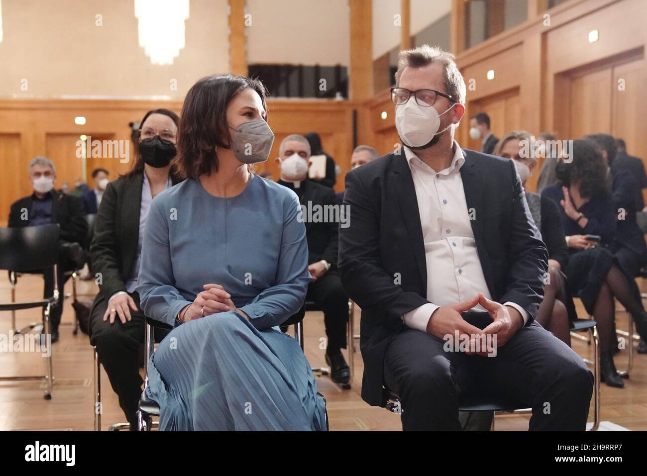 Berlin, Germany. 08th Dec, 2021. Annalena Baerbock sits next to her ...