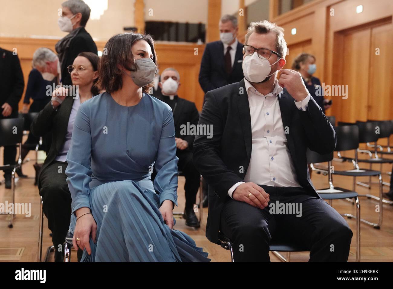 Berlin, Germany. 08th Dec, 2021. Annalena Baerbock sits next to her ...