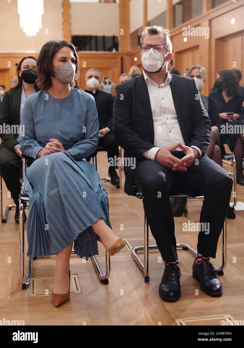 Berlin, Germany. 08th Dec, 2021. Annalena Baerbock sits next to her ...