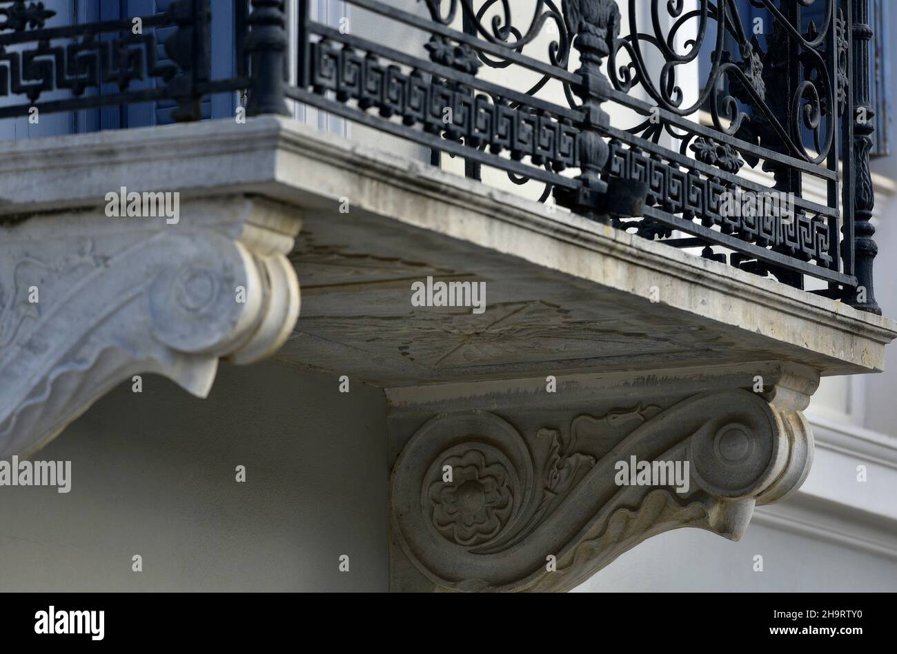Neoclassical house facade with a custom crafted iron balcony railing ...