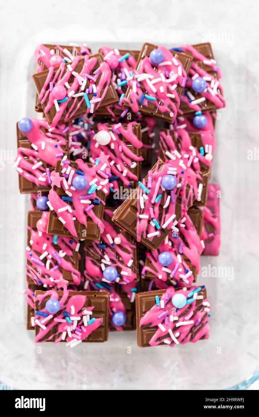 Gourmet dark mini chocolates with drizzled pink chocolate and fancy ...