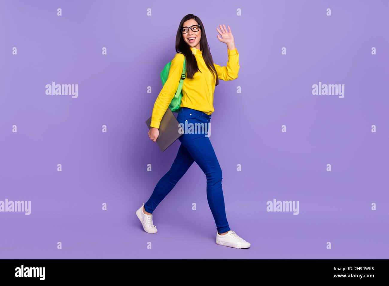 Full size profile side photo of lovely young woman wave hello look ...