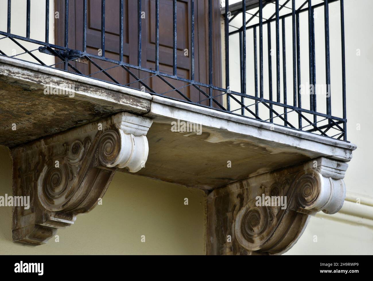 Neoclassical house facade with a custom crafted iron balcony railing ...