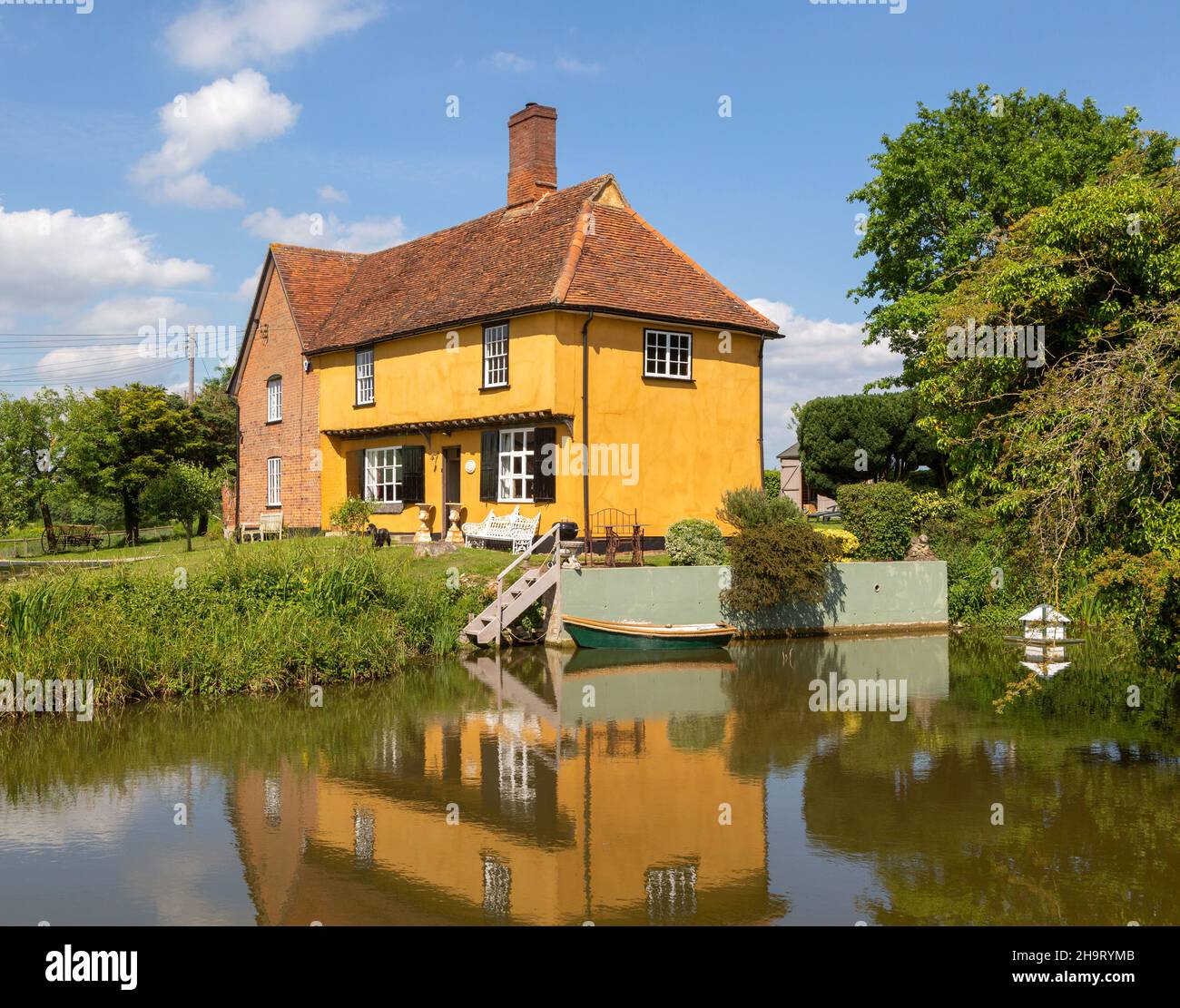 Historic farmhouse building by pond, Hill Farm, Whatfield, Suffolk ...