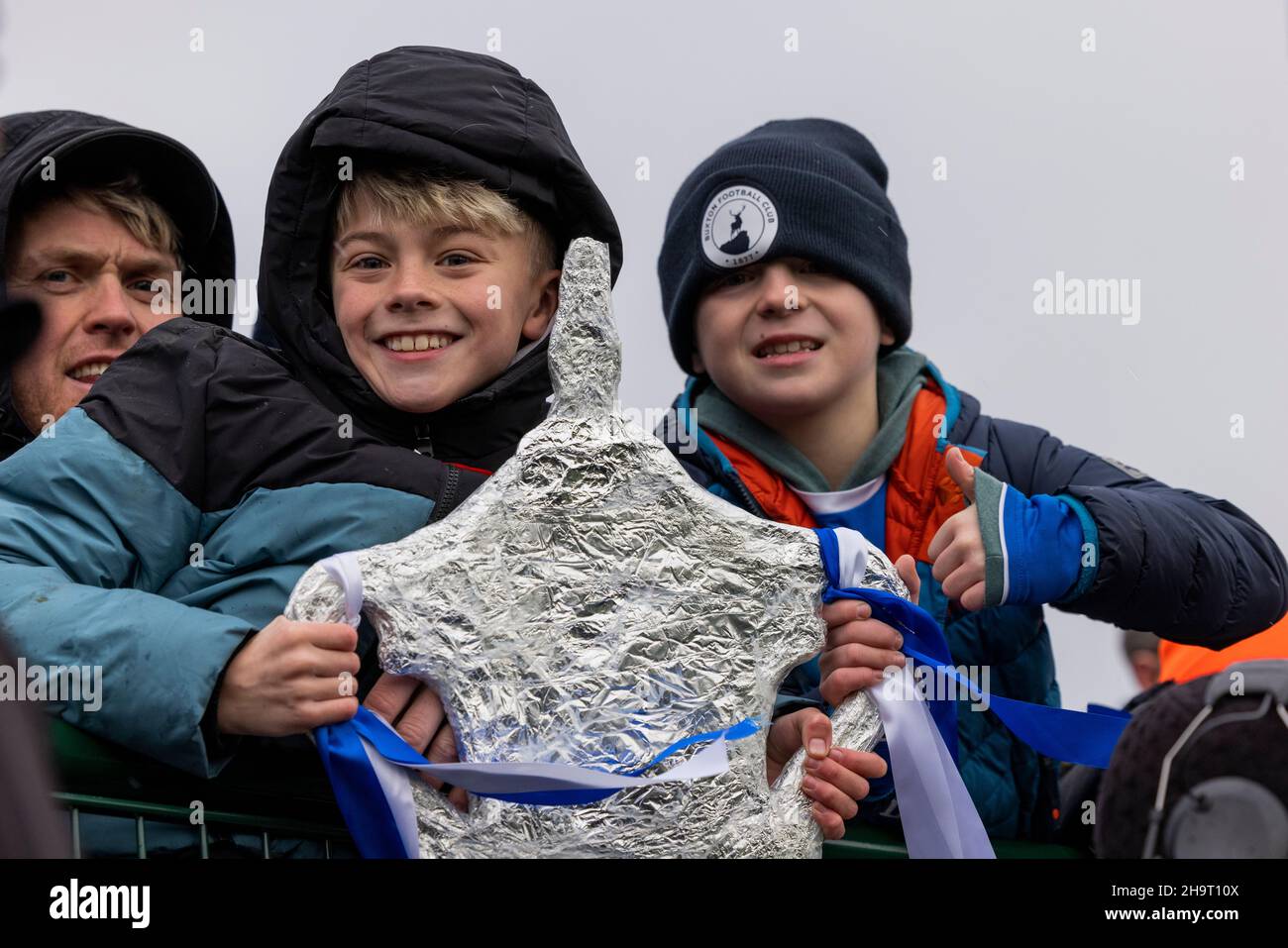 Buxton fans with a replica tin FA cup trophy during the Emirates FA Cup ...