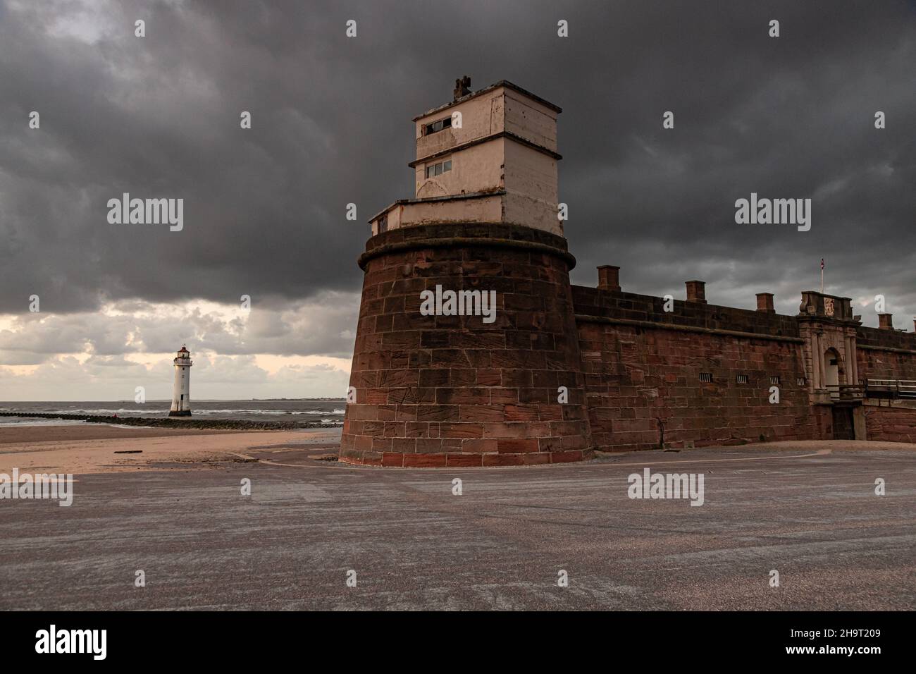 New Brighton lighthouse and Fort Perch Rock, Wirral, England Stock ...