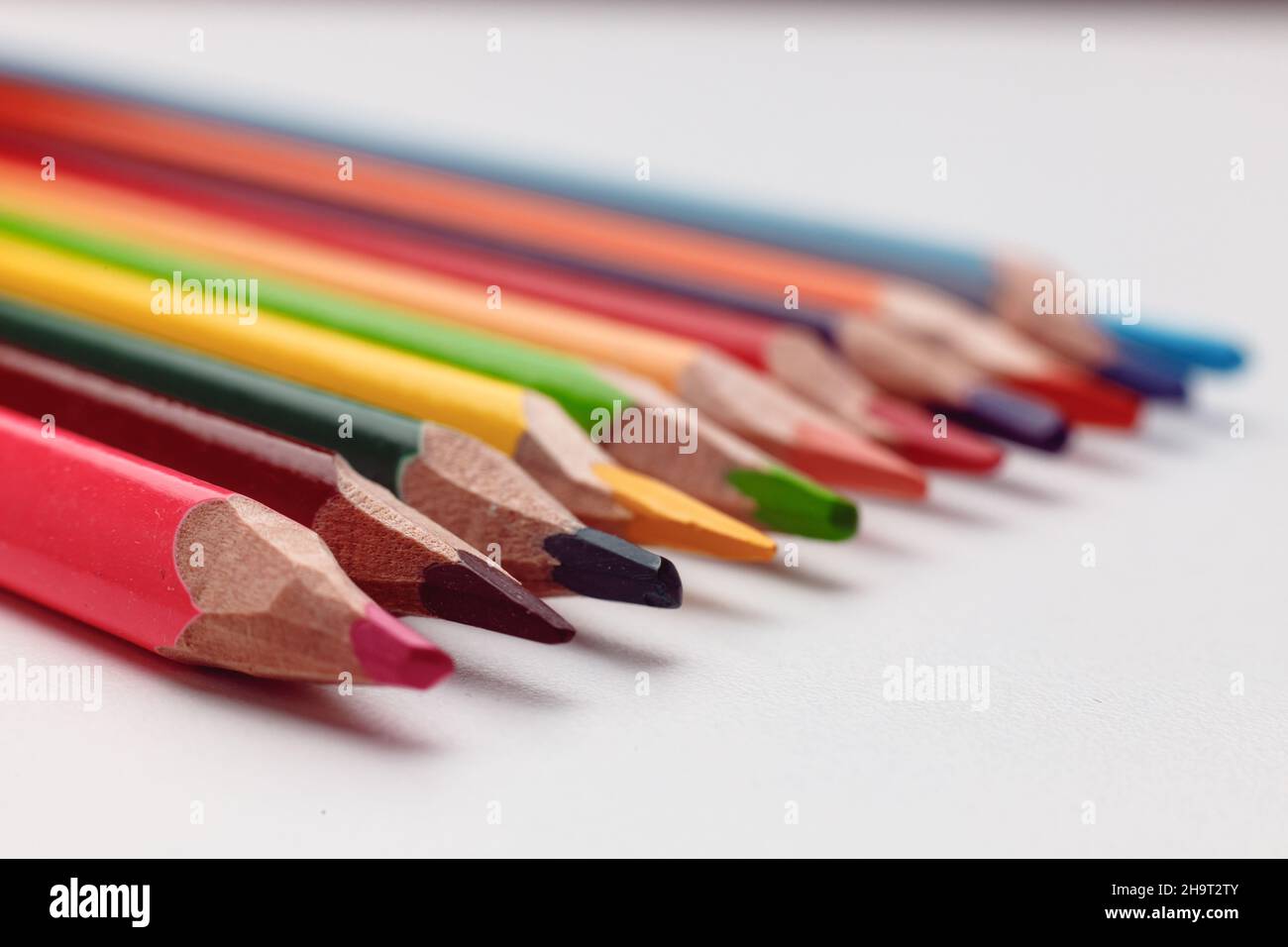 Spectrum of color pencils with white copyspace Stock Photo - Alamy