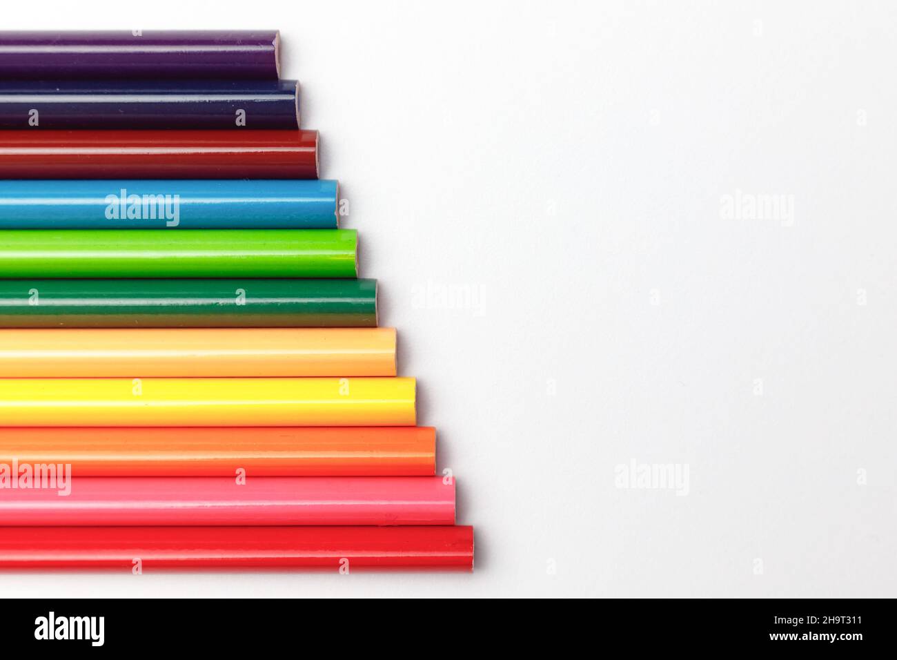Spectrum of color pencils with white copyspace Stock Photo - Alamy