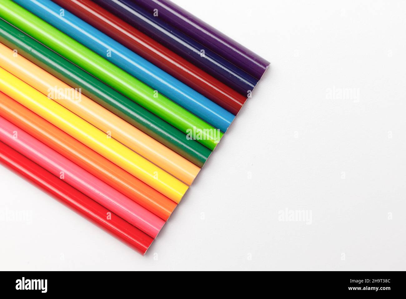 Spectrum of color pencils with white copyspace Stock Photo - Alamy