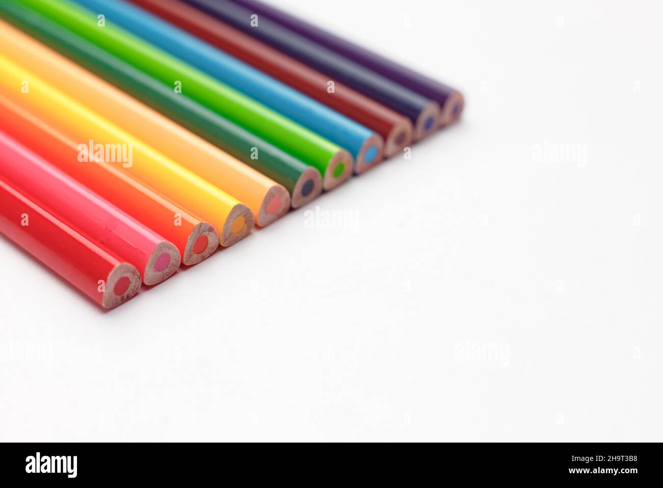 Spectrum of color pencils with white copyspace Stock Photo - Alamy