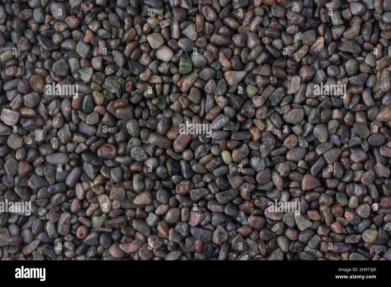decorative pebbles, dark blue color stones background texture ...