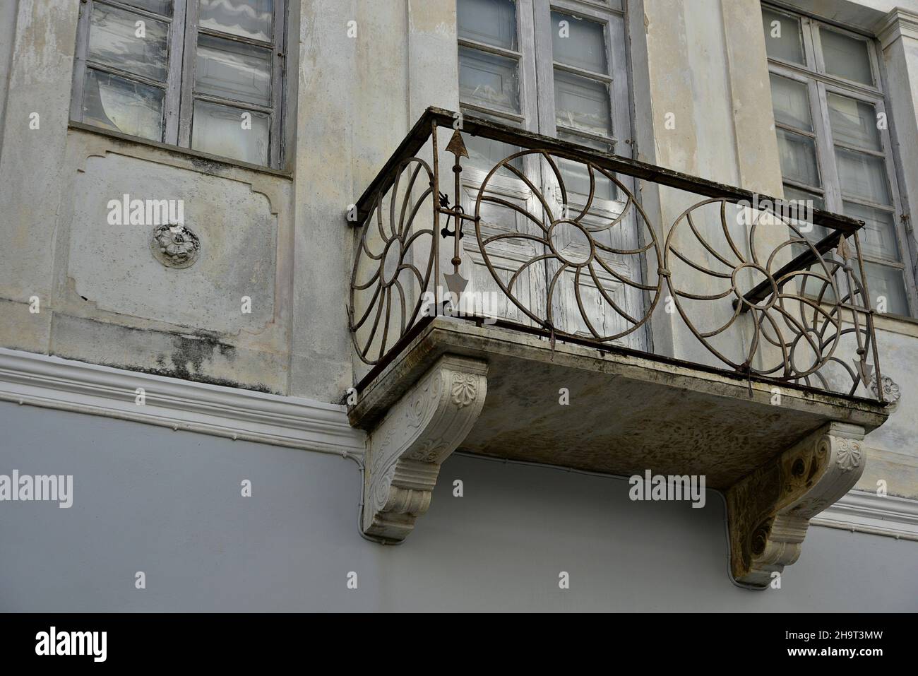 Neoclassical house facade with a custom crafted iron balcony railing ...