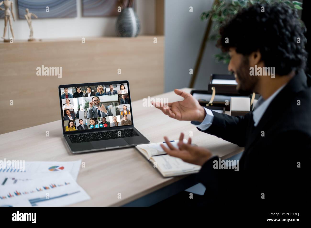 Online business meeting, brainstorm of employees. Indian successful man ...
