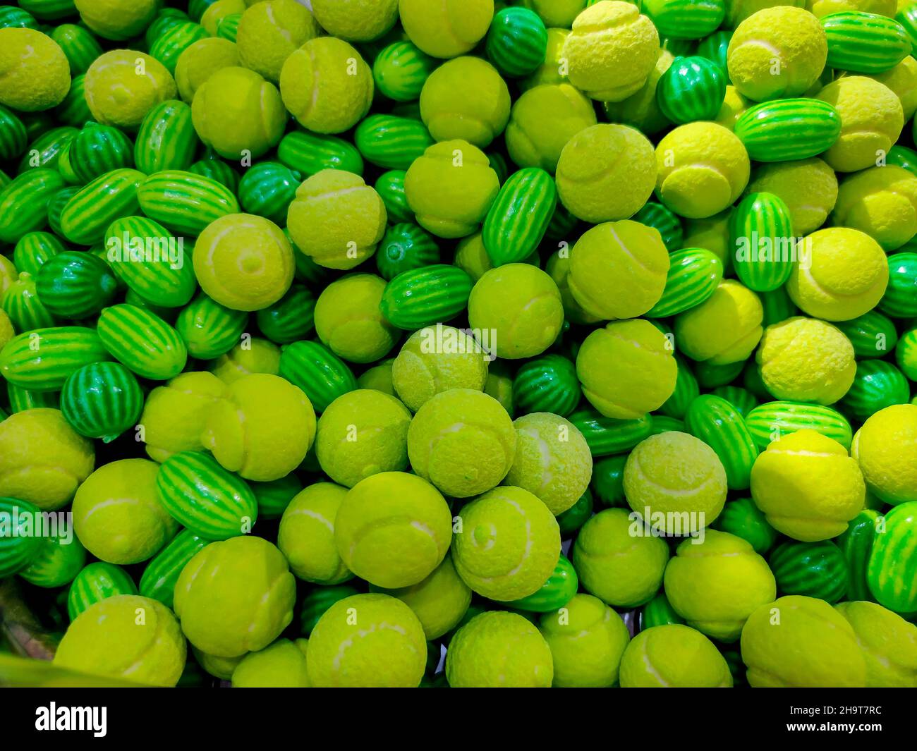 Background from multicolored chewing candies of different forms Stock ...