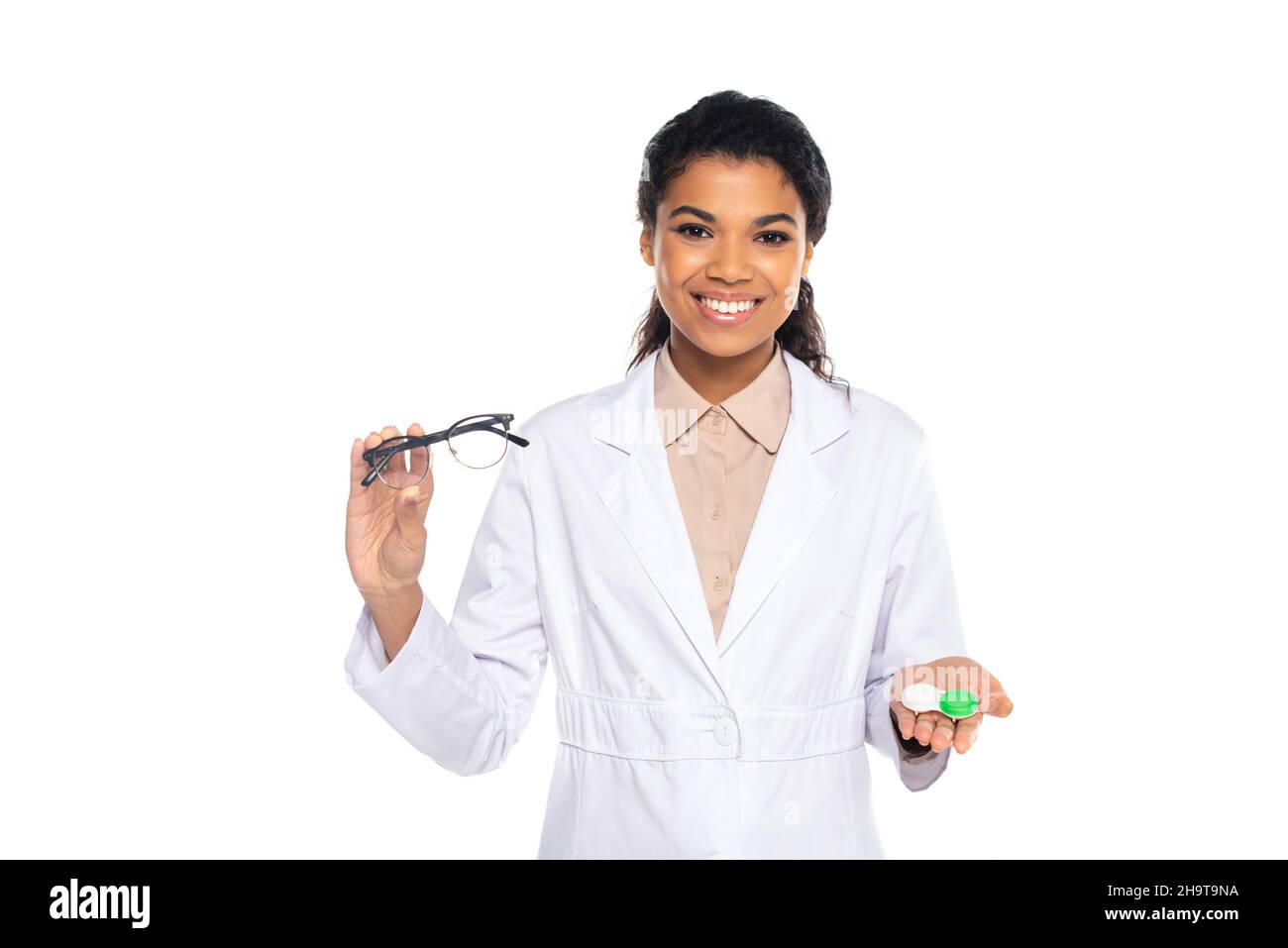 Positive african american doctor holding eyeglasses and optical lenses ...