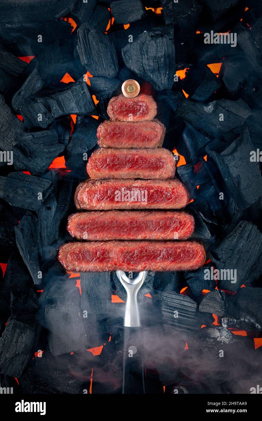 New year tree made from pieces of chopped grilled beef Stock Photo - Alamy