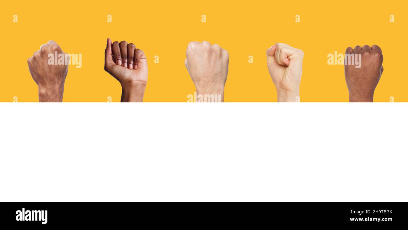 Closeup of people hands with closed clenched fist Stock Photo - Alamy