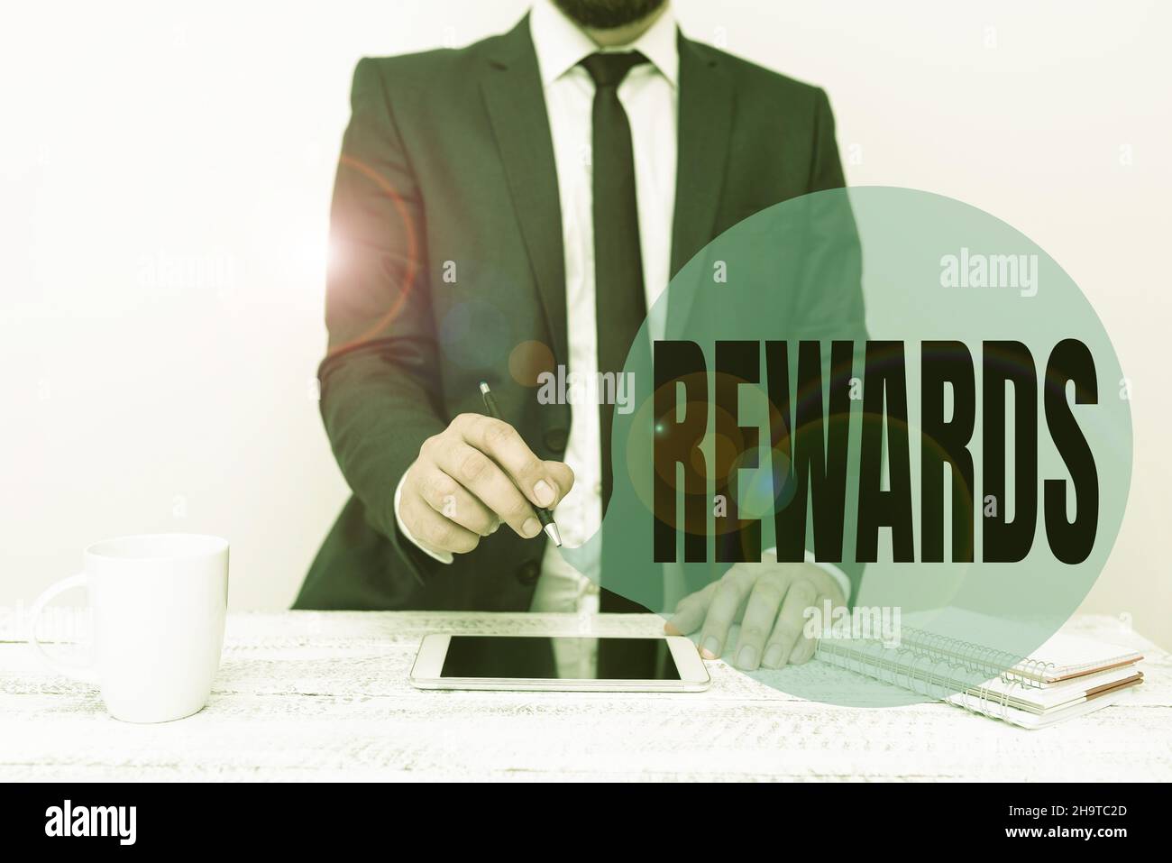 Writing displaying text Rewards. Business idea Given in recognition of ...