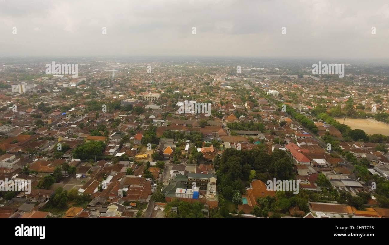 cityscape Yogyakarta with buildings, highway at sunset time. aerial ...