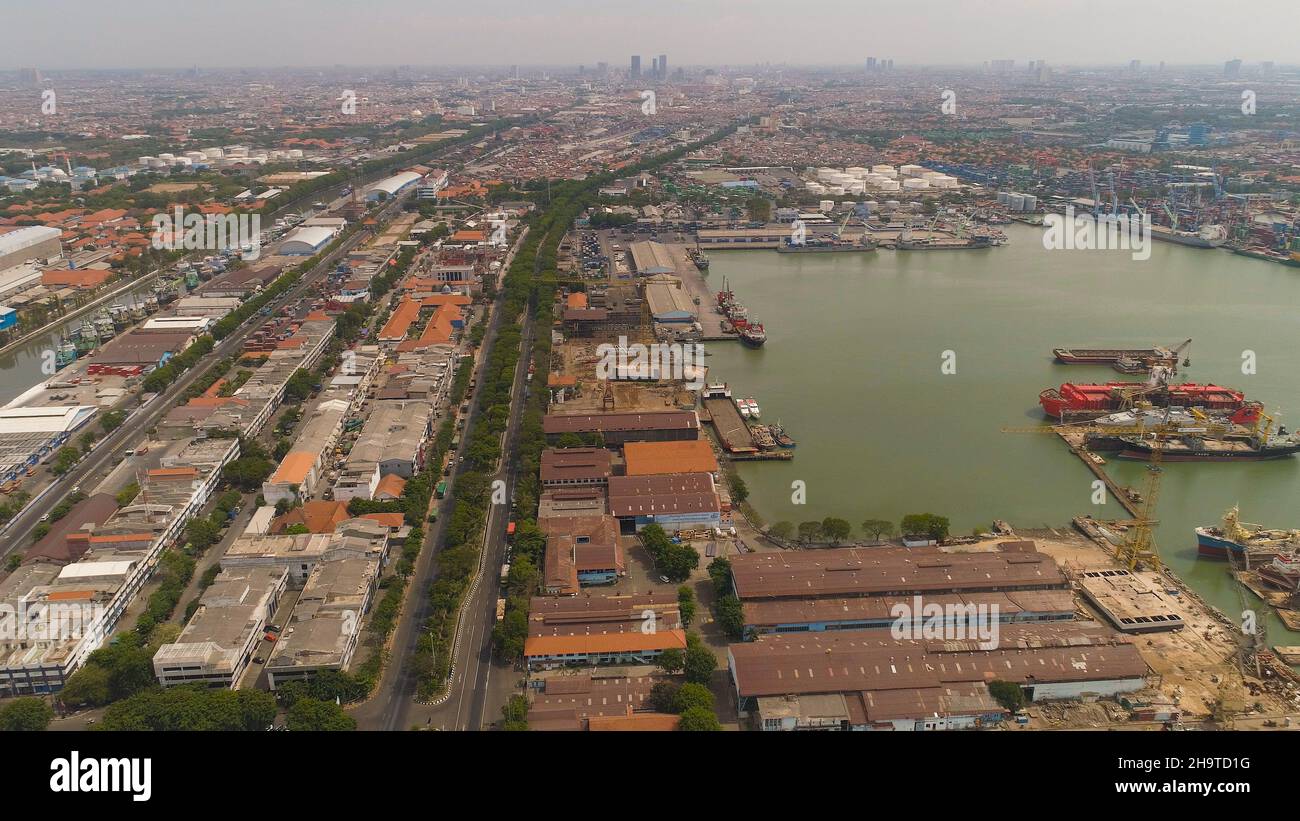 aerial view cargo and passenger seaport with ships and crane Tanjung ...