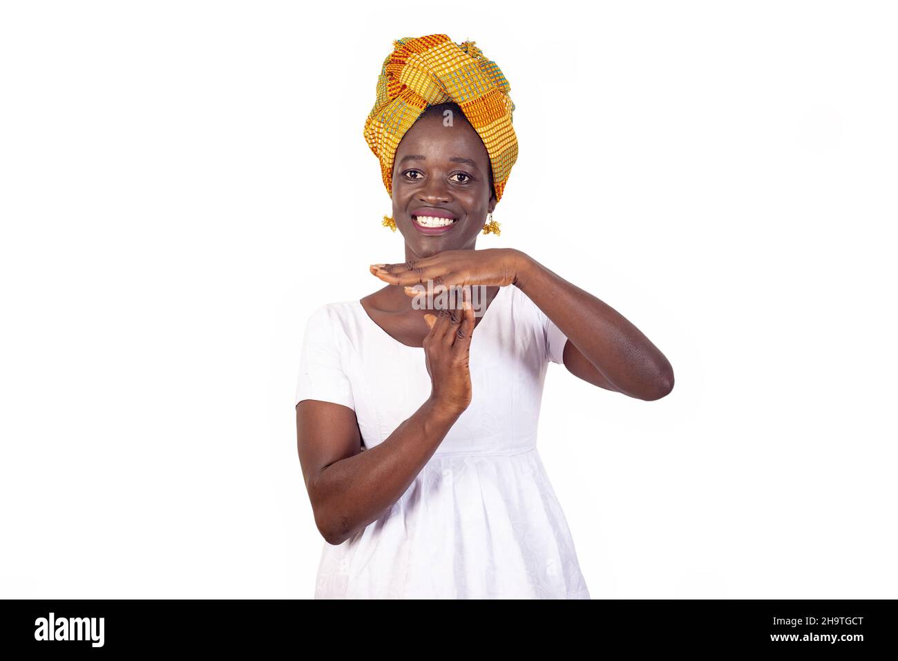 beautiful young woman doing symbol of downtime or break to stop working ...