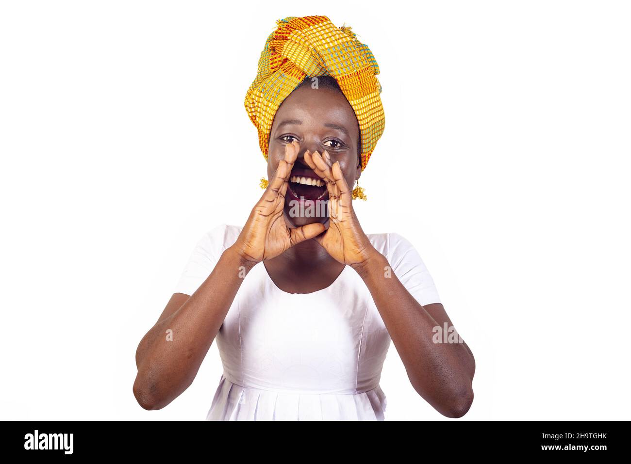 beautiful young woman wearing traditional holding, giving a big scream ... beautiful young woman wearing traditional holding, giving a big scream ...