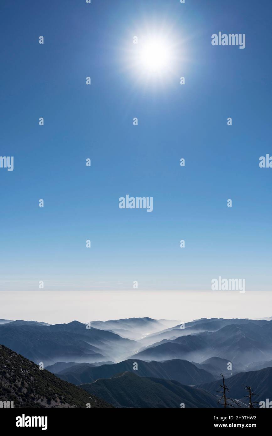 View of cloud filled canyons with clear blue sunshine from the South Mt ...