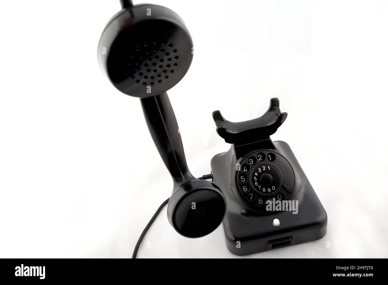 old black rotary phone, cut out Stock Photo - Alamy