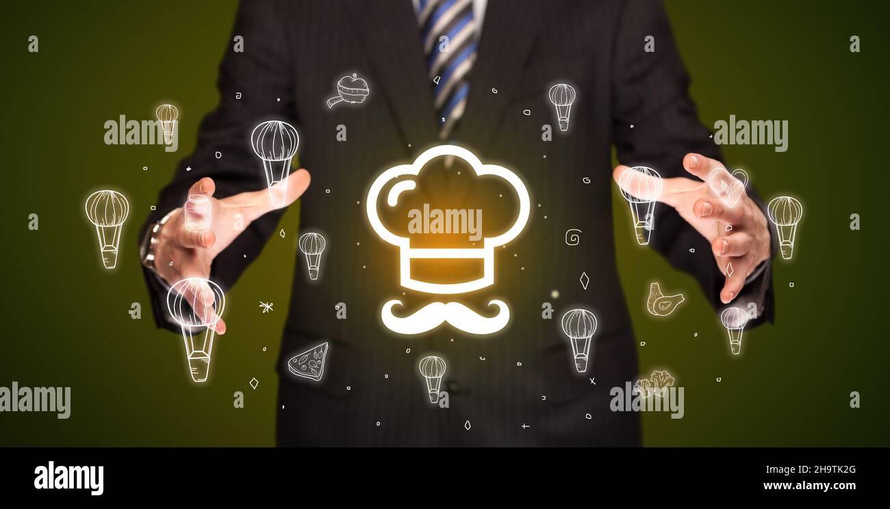 Hand holding food related icons Stock Photo - Alamy