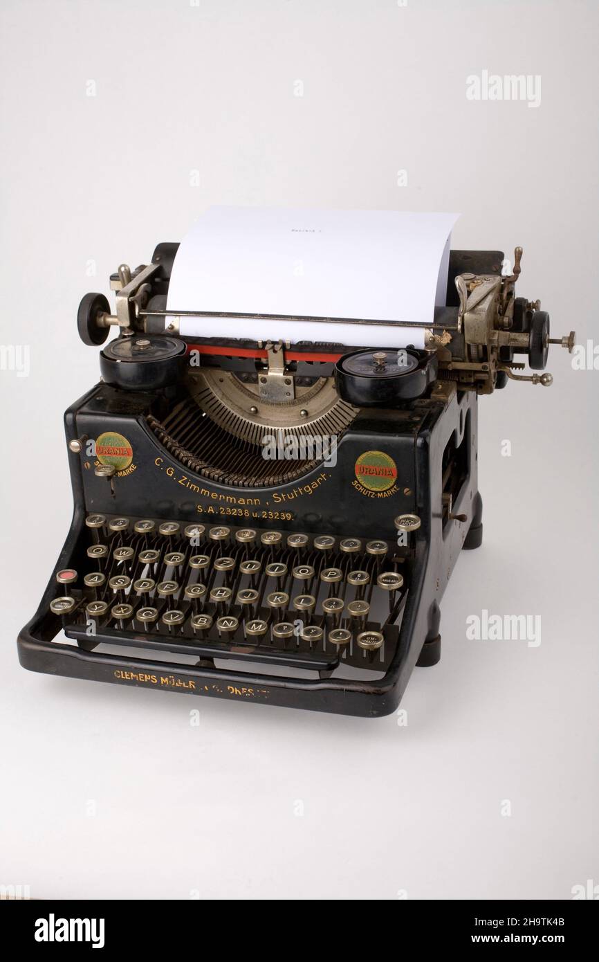 old mechanical black typewriter of Urania, cut out Stock Photo - Alamy