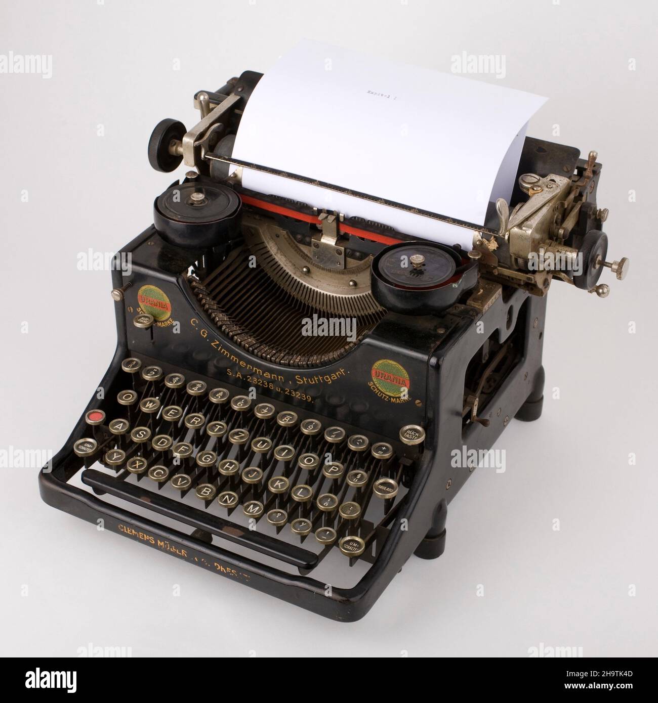 old mechanical black typewriter of Urania, cut out Stock Photo - Alamy