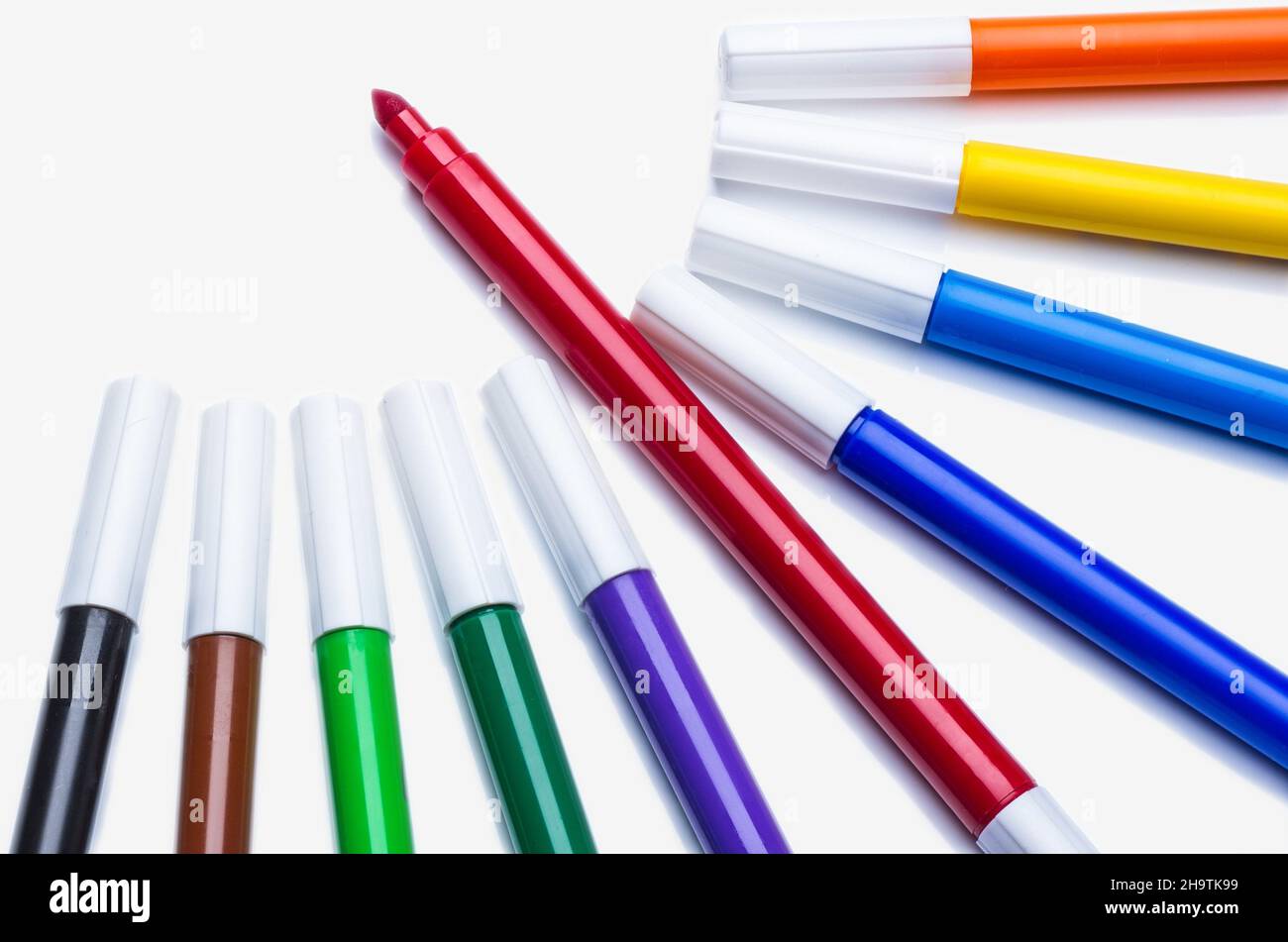 coloured felt-tip pens, with red pencil Stock Photo - Alamy