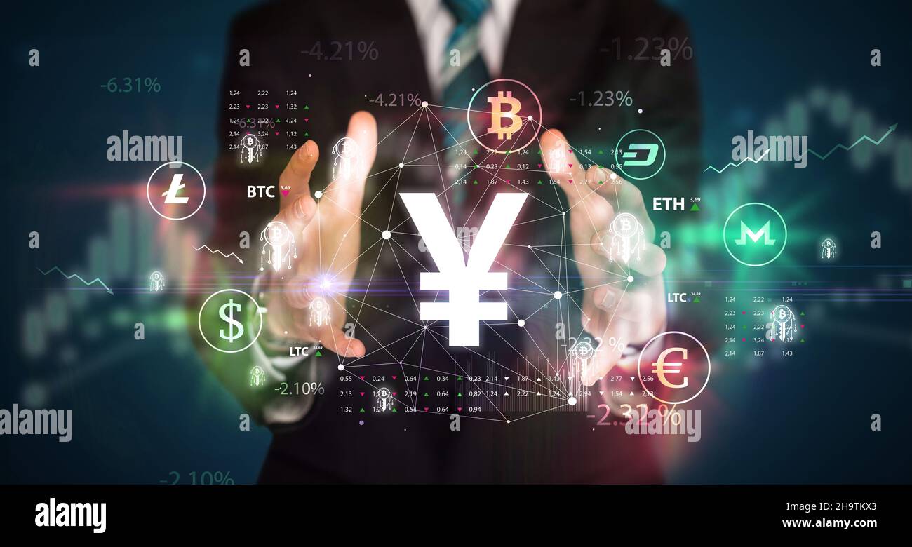 Businessman holding currency symbols concept Stock Photo - Alamy