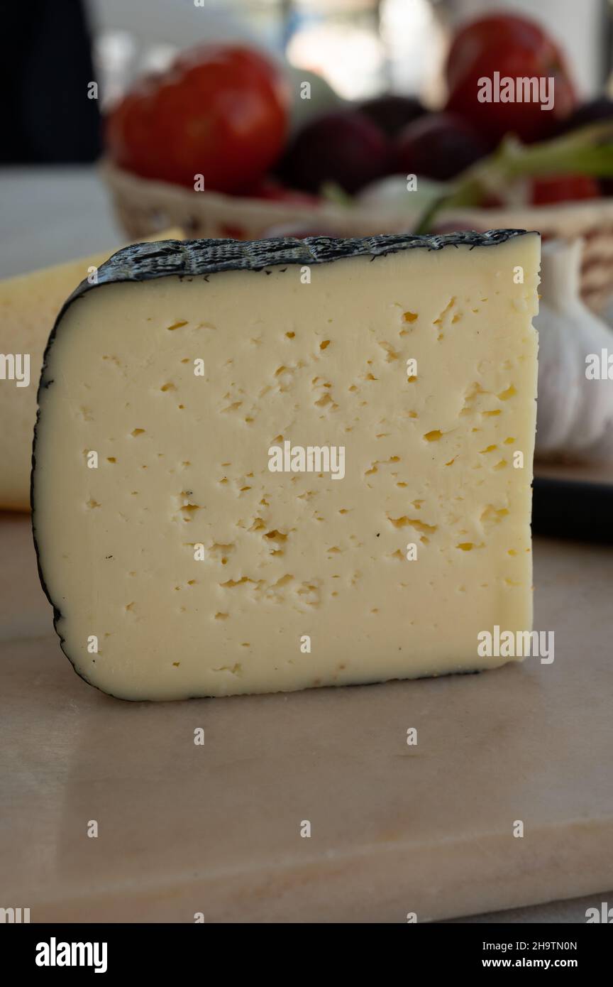 Cheese collection, French fol epi cheese with many little holes, etorki ...