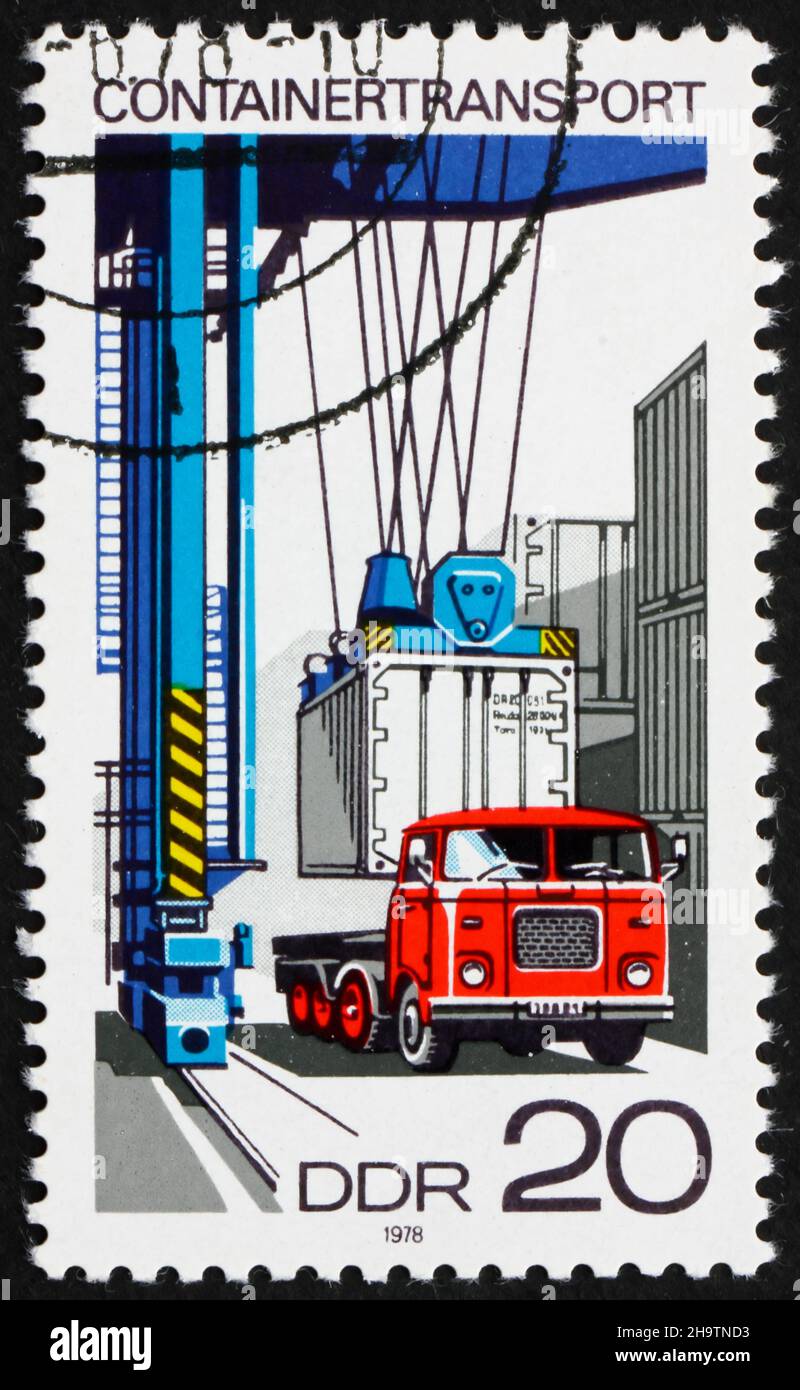 GDR - CIRCA 1978: a stamp printed in GDR shows Loading Container on ...