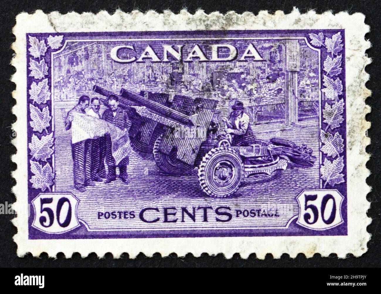CANADA - CIRCA 1942: a stamp printed in the Canada shows Cannon ...
