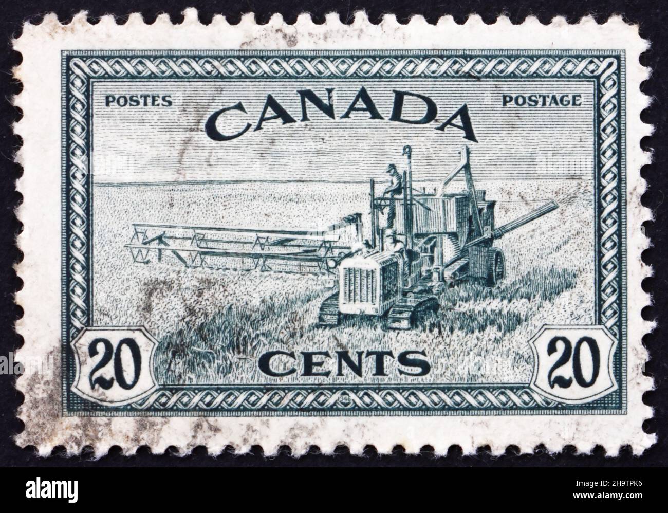 CANADA - CIRCA 1946: a stamp printed in the Canada shows Combine ...