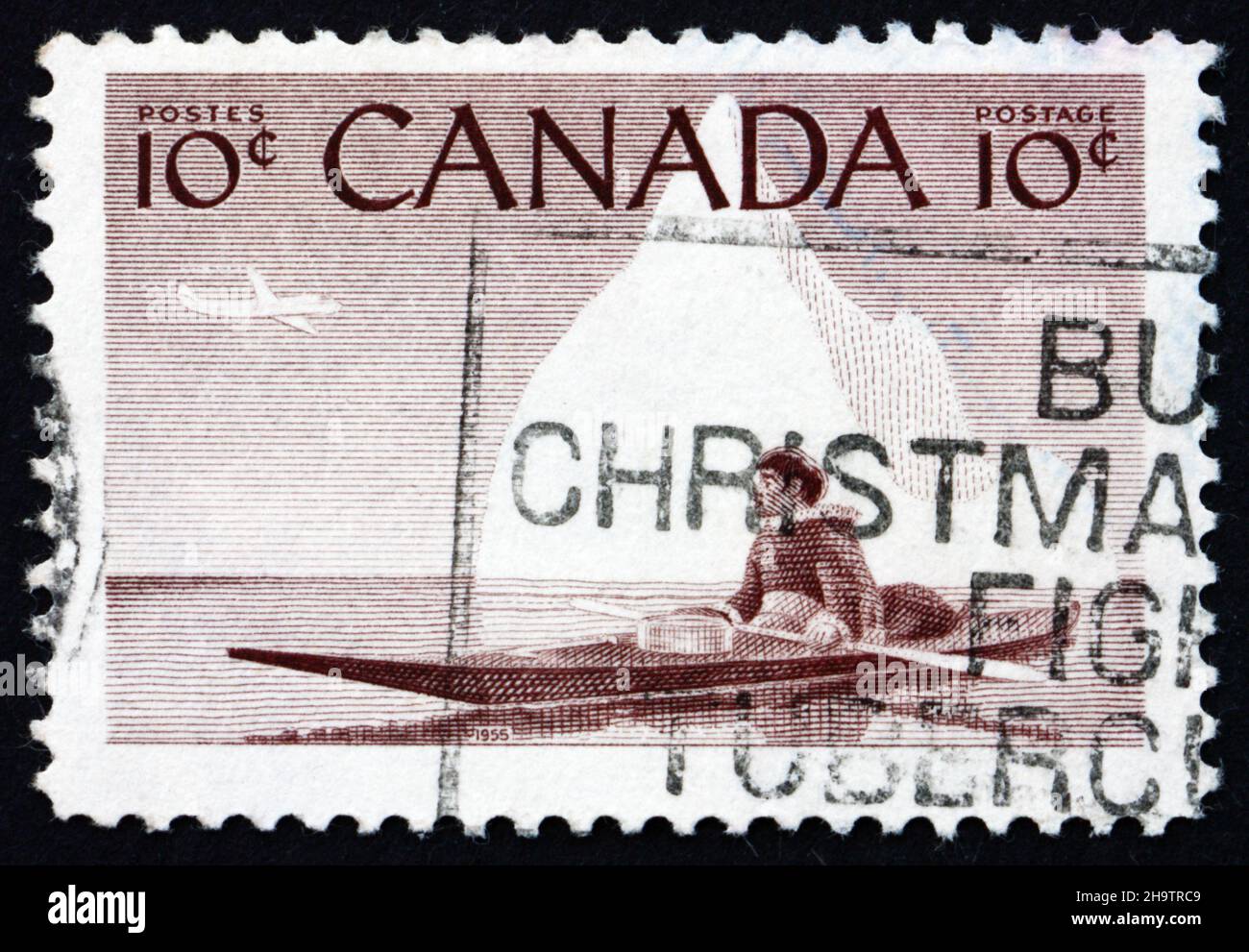 CANADA - CIRCA 1955: a stamp printed in the Canada shows Eskimo and ...