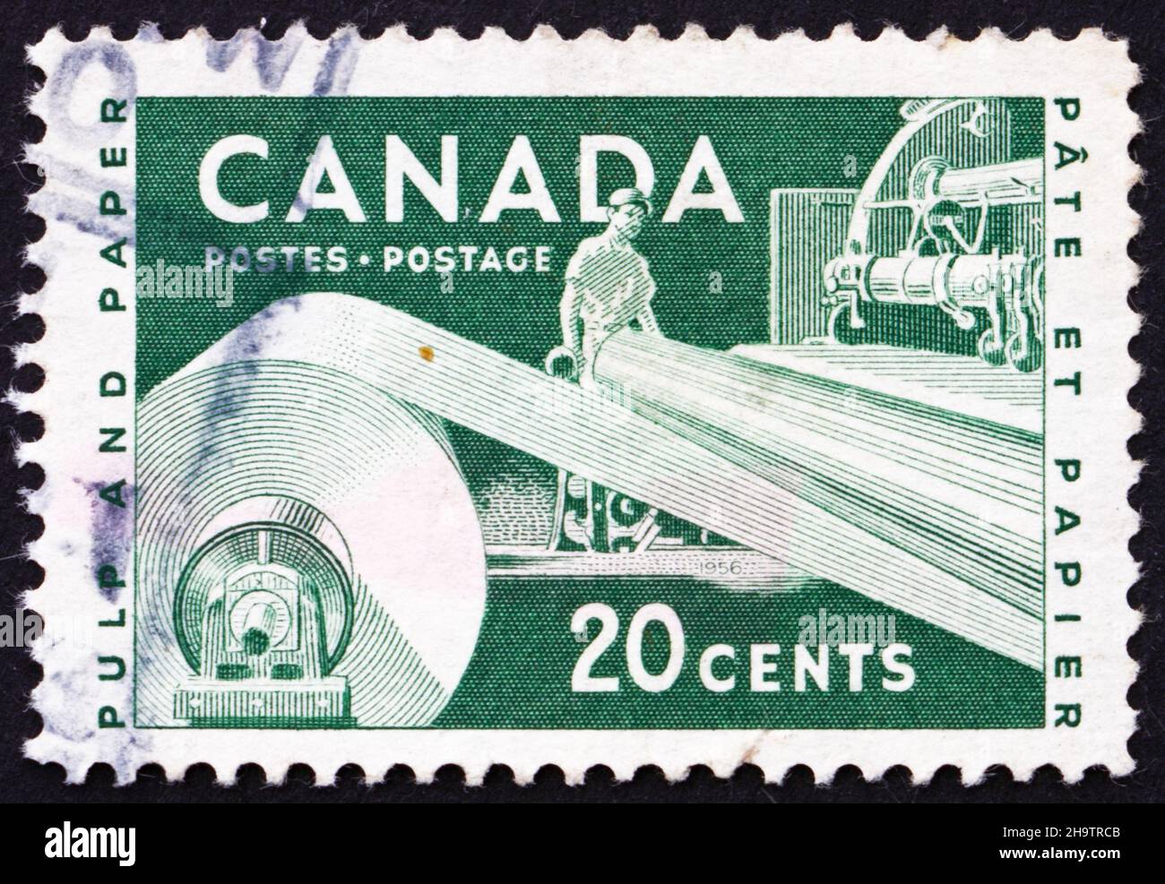 CANADA - CIRCA 1952: a stamp printed in the Canada shows Paper Industry ...