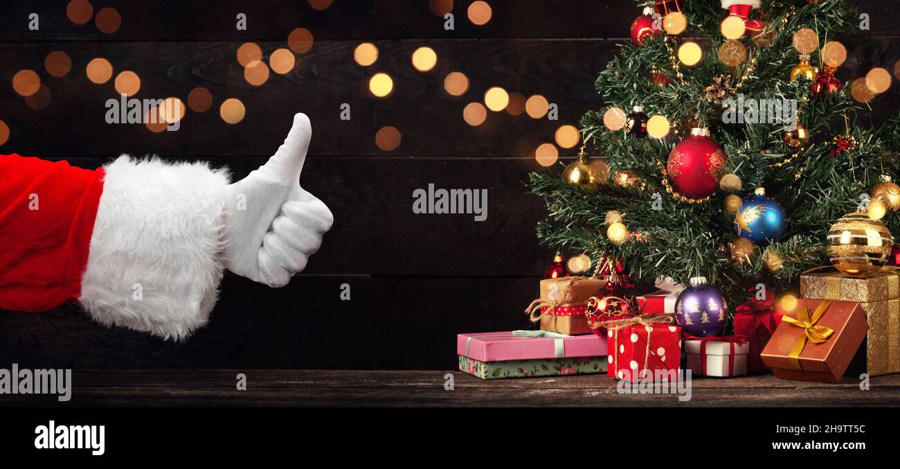 Santa Claus thumb up gesture. Merry Christmas composition concept Stock ...