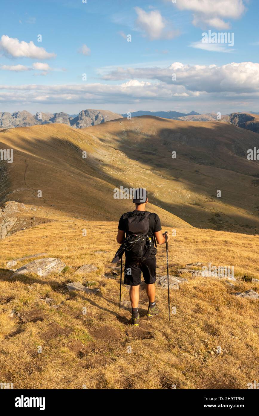 Lone hiker at Otovitsa Ridge on the E4 European Long Distance Path ...