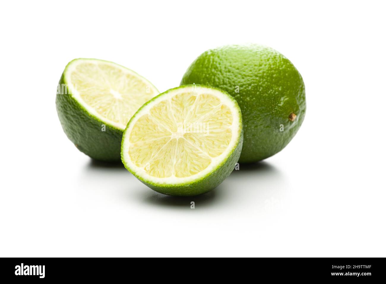 lime, lying, close-up, half fresh, half, green, whole, three, limes ...