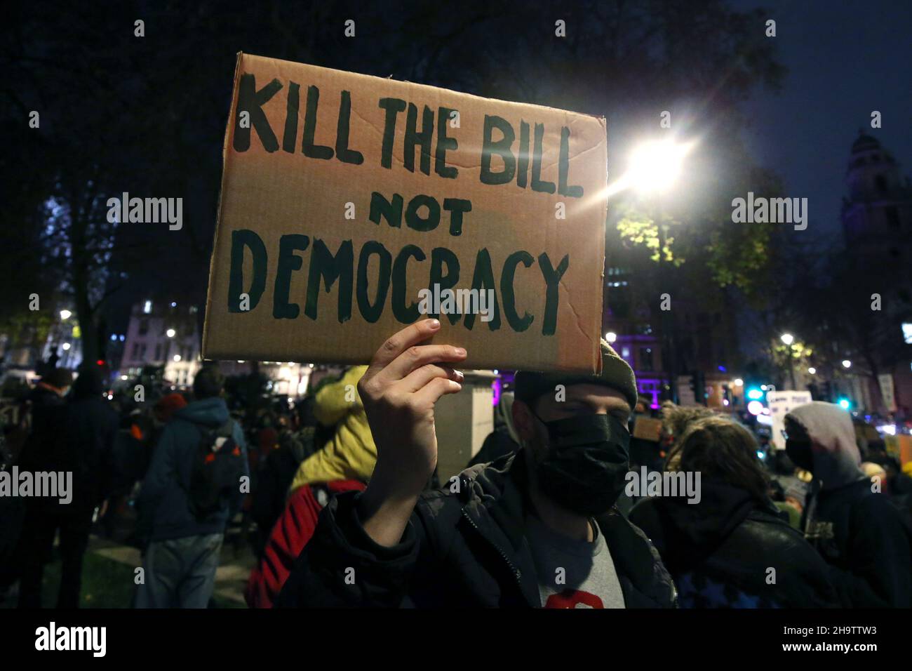 A protestor holding up a sign during the 'Kill the Bill' protest at ...