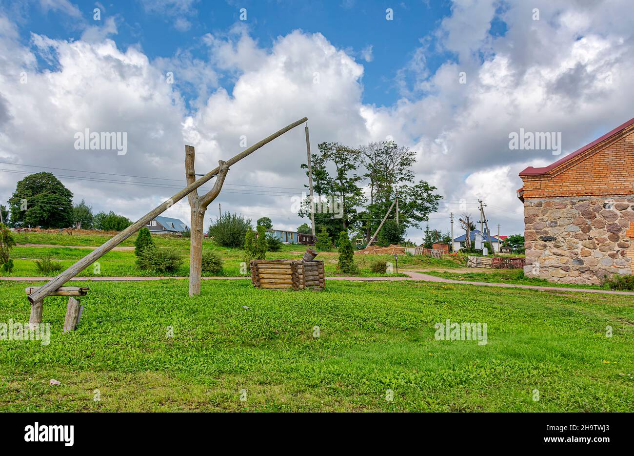 The crane is a lever with a counterweight on one arm and a bucket for ...