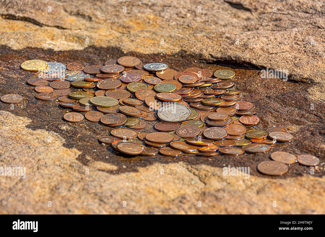 The custom of throwing a coin to return Stock Photo - Alamy