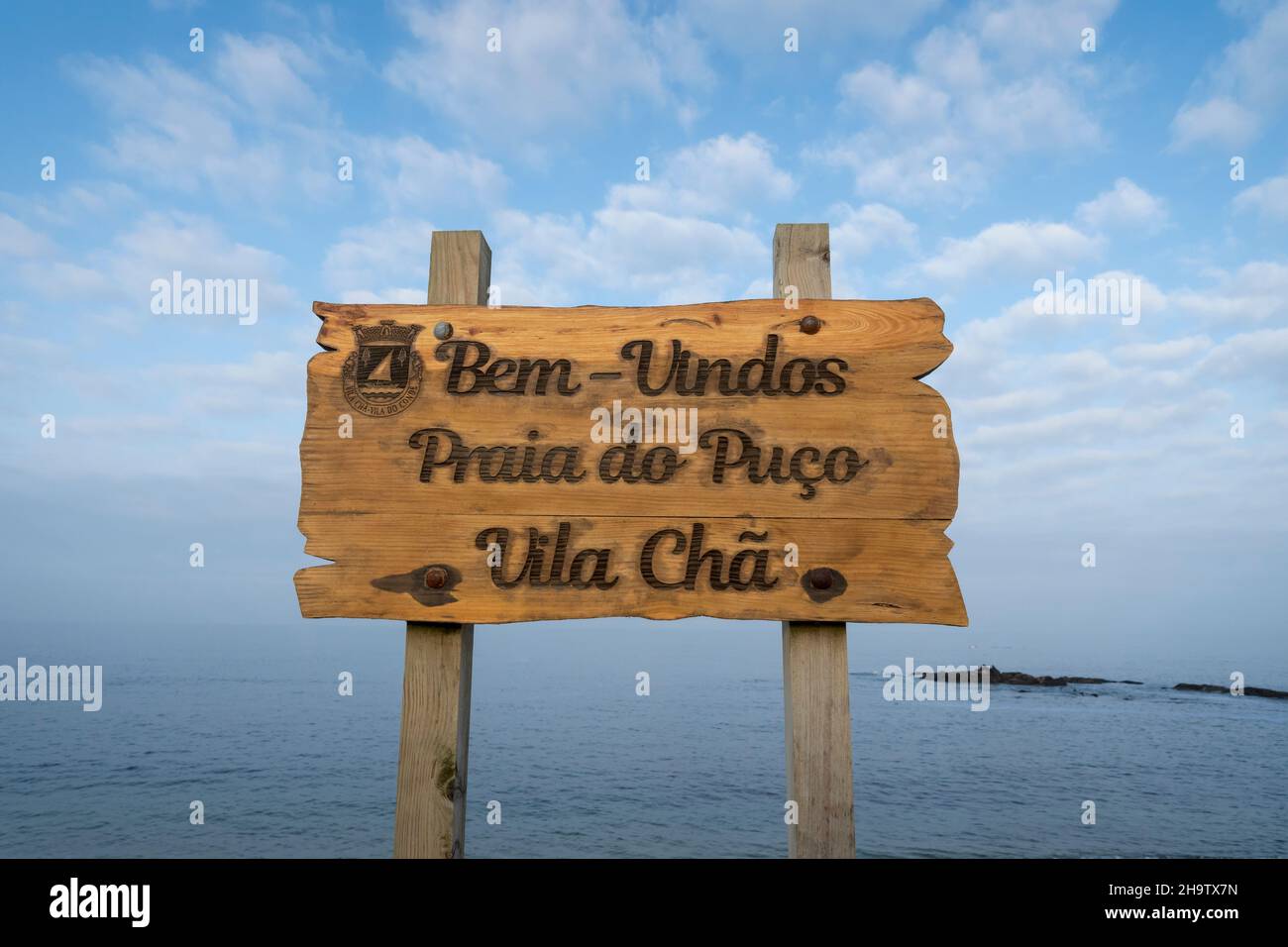 A rustic sign marks Praia do Puço along the Camino Portuguese in Vila ...