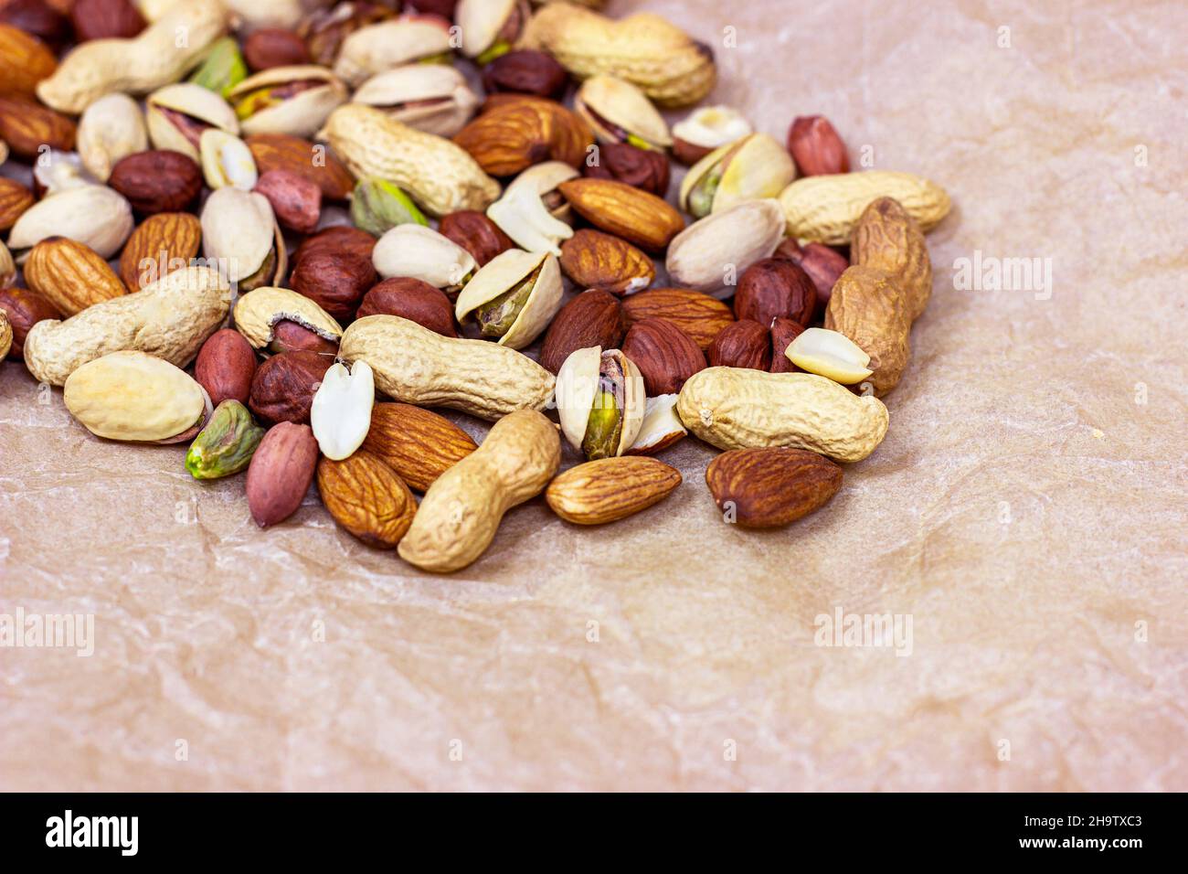 Pistachios and peanuts hi-res stock photography and images - Alamy