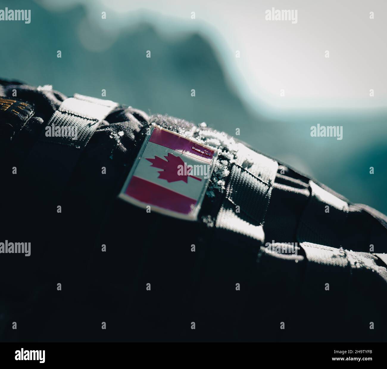 Closeup of a velcro patch of the Canadian flag on the black tactical ...