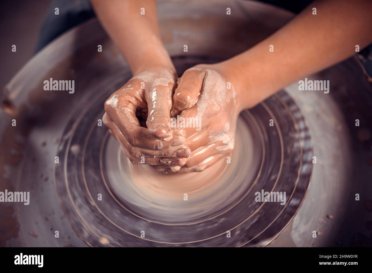 Creating vase of clay close-up. Master crock. The sculptor in the ...