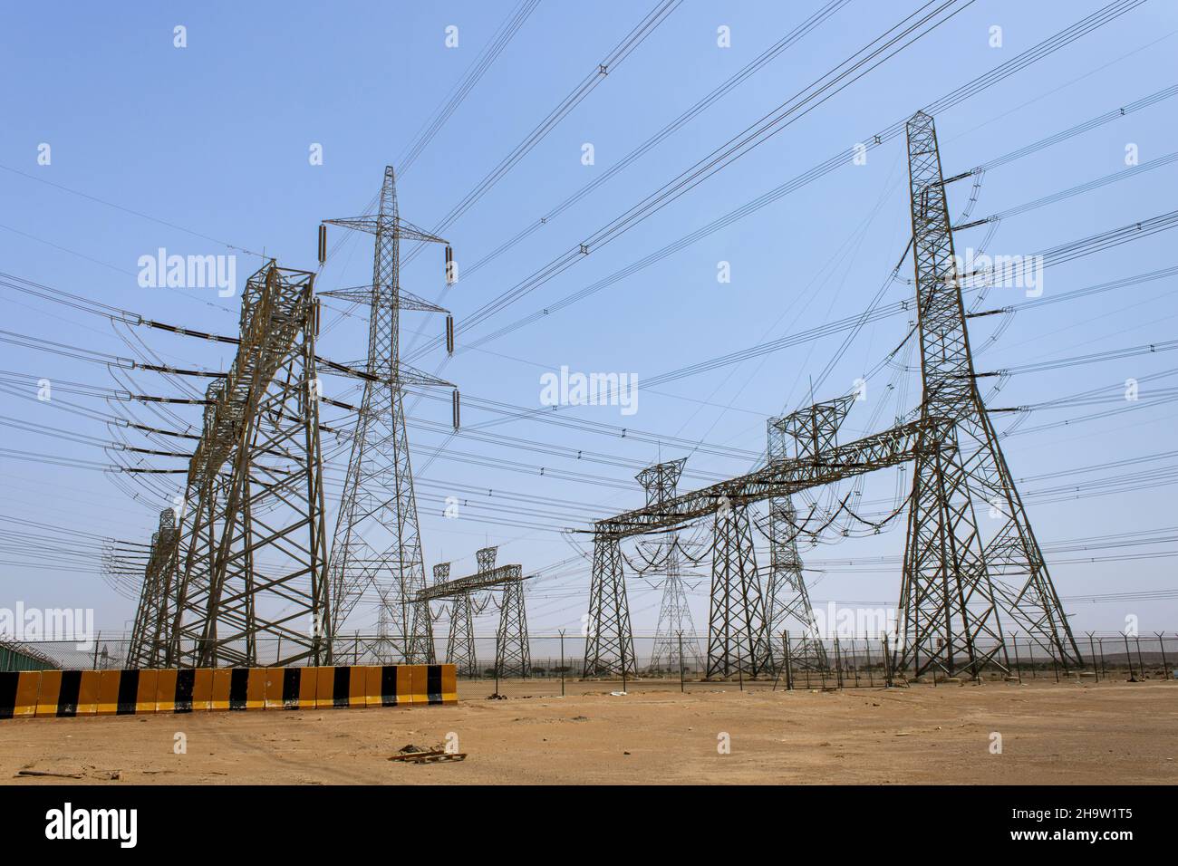 A high-voltage power line masts in Riyadh Province, Saudi Arabia Stock ...